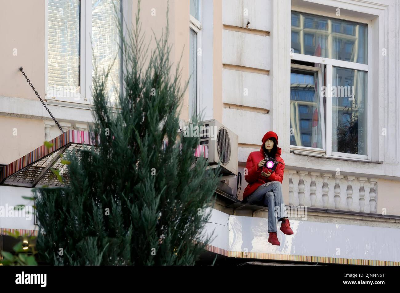 Female dummy with photo camera Stock Photo - Alamy