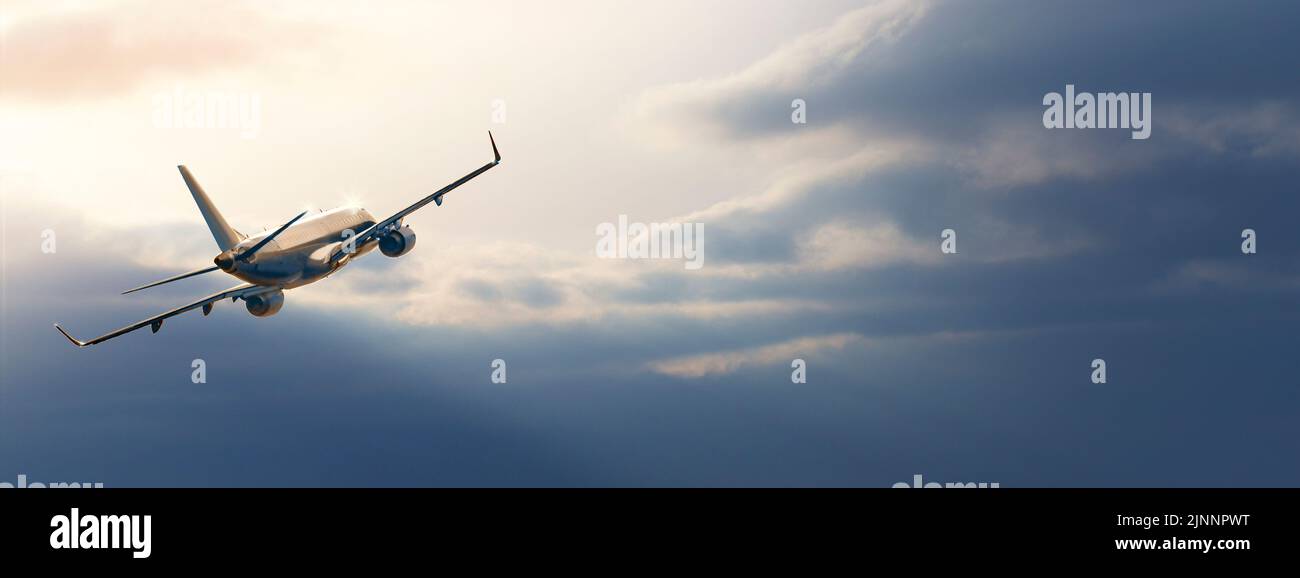 Airplane flying in the beautiful sky through the clouds at sunset Stock ...