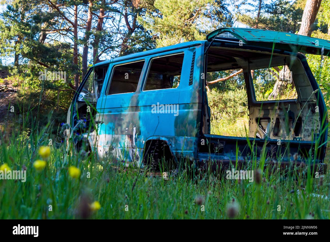 Old, damaged car. Abandoned car in the woods.Defective car. A car unfit ...