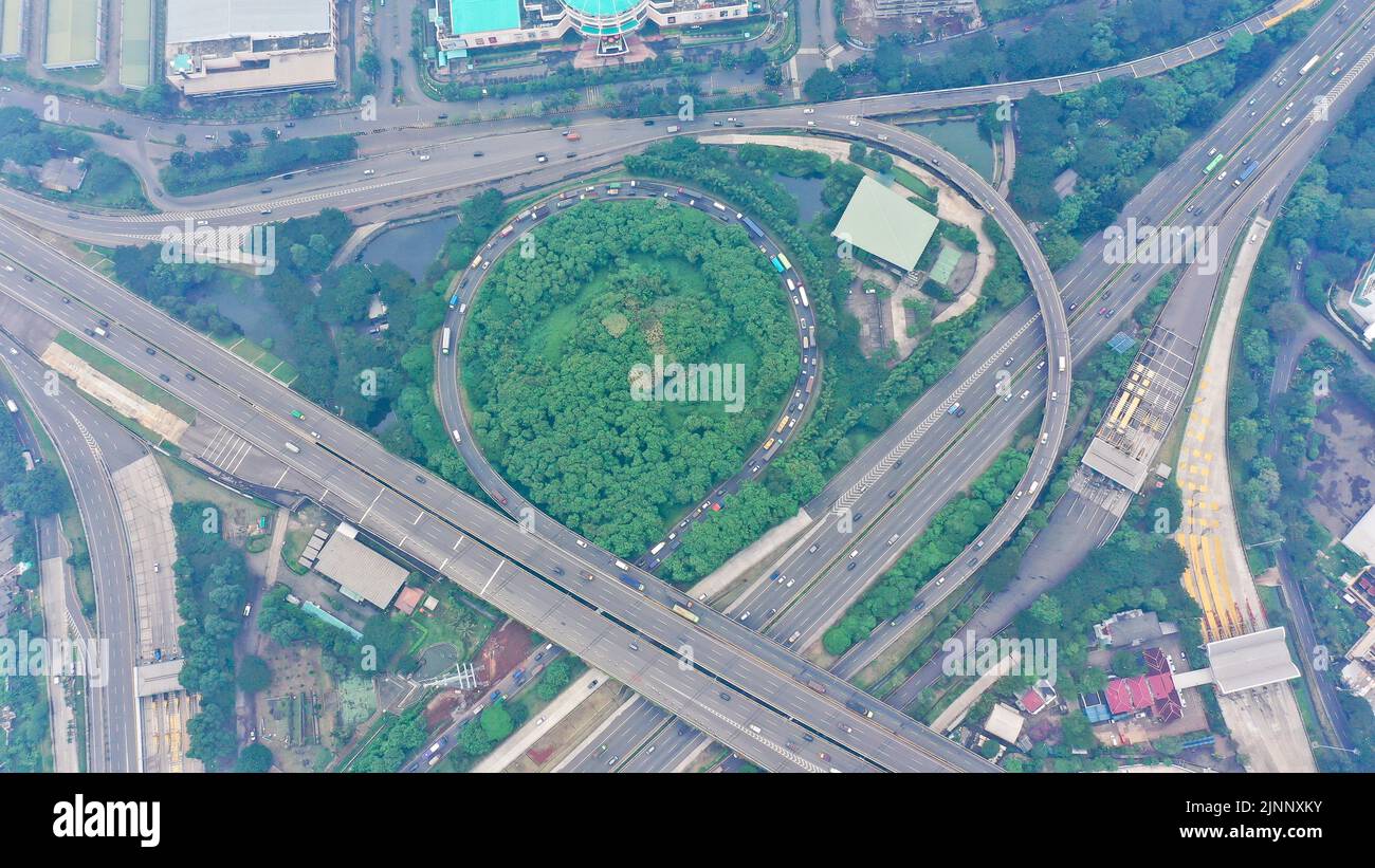 Aerial top down view on massive multi-level interchange on Jakarta city ...