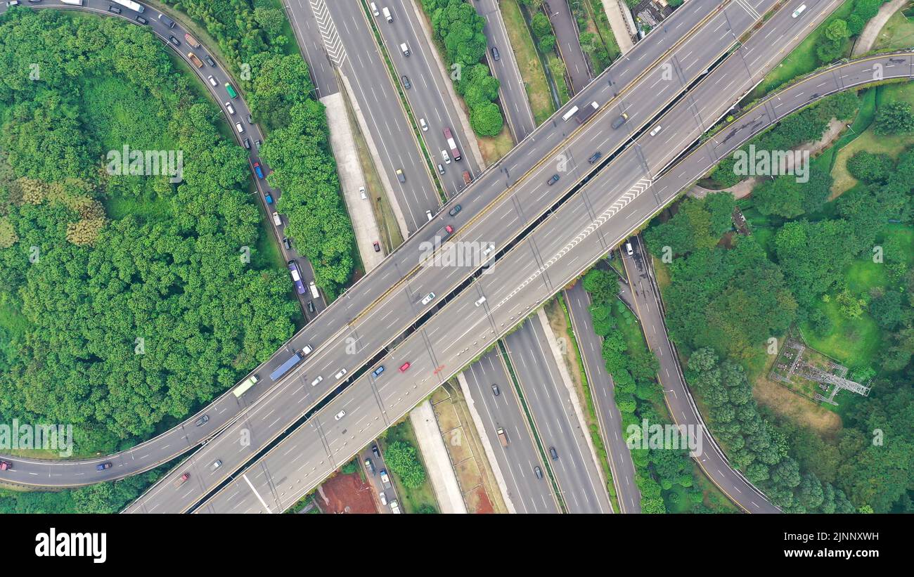 Aerial top down view on massive multi-level interchange on Jakarta city ...