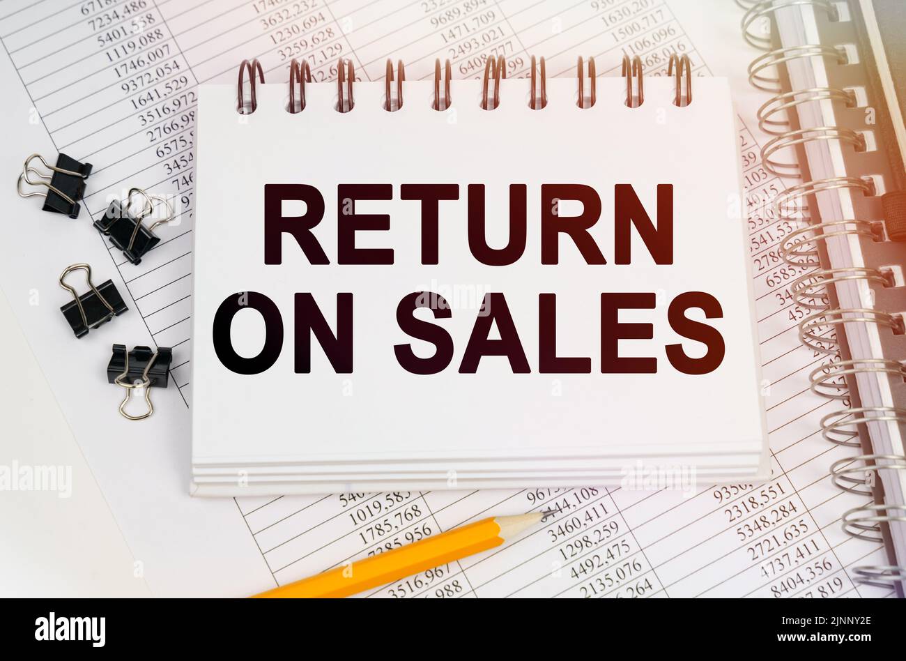 Business concept. On the table is a pen and a notebook with ...