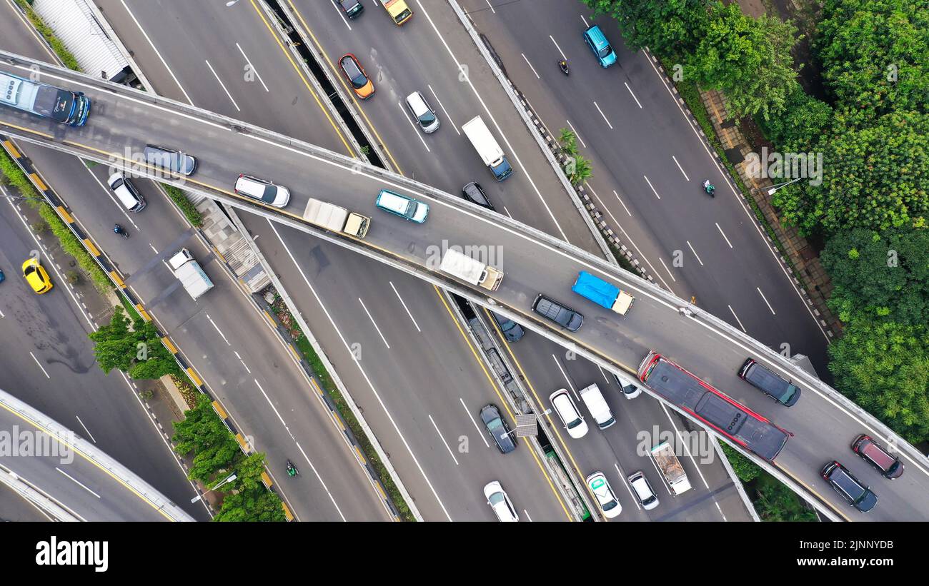 Aerial top down view on massive multi-level interchange on Jakarta city ...