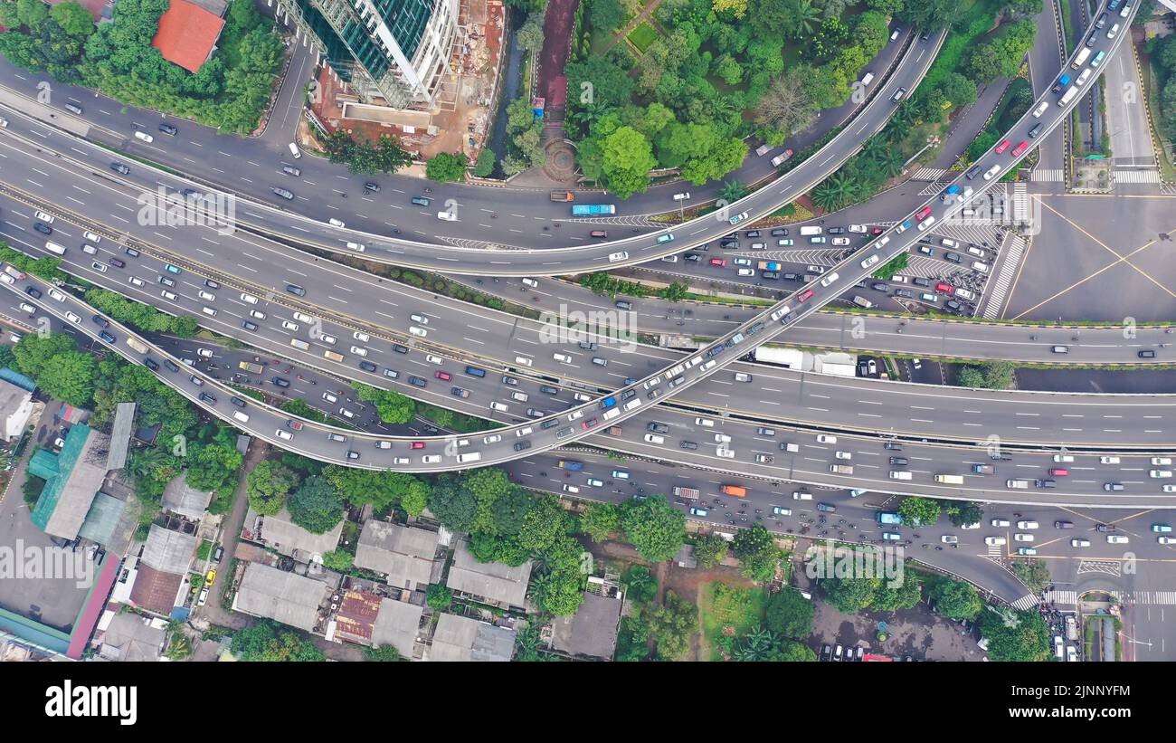 Aerial top down view on massive multi-level interchange on Jakarta city ...