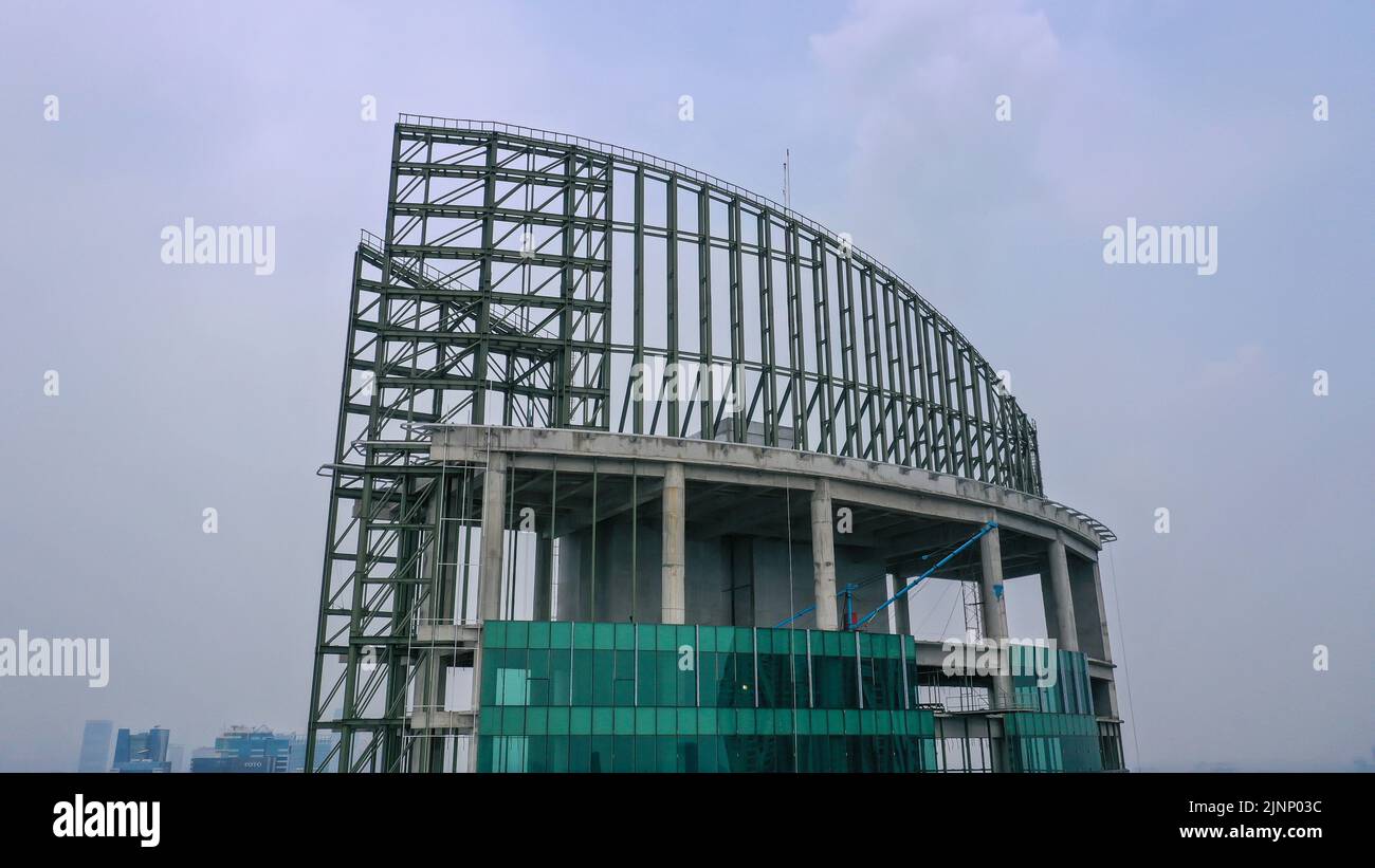 Construction of high-rise skyscrapers with many floors using cranes ...