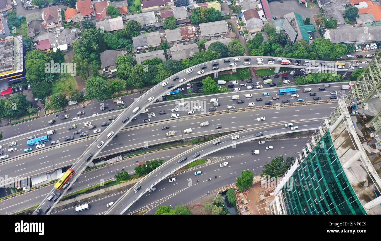 Aerial top down view on massive multi-level interchange on Jakarta city ...