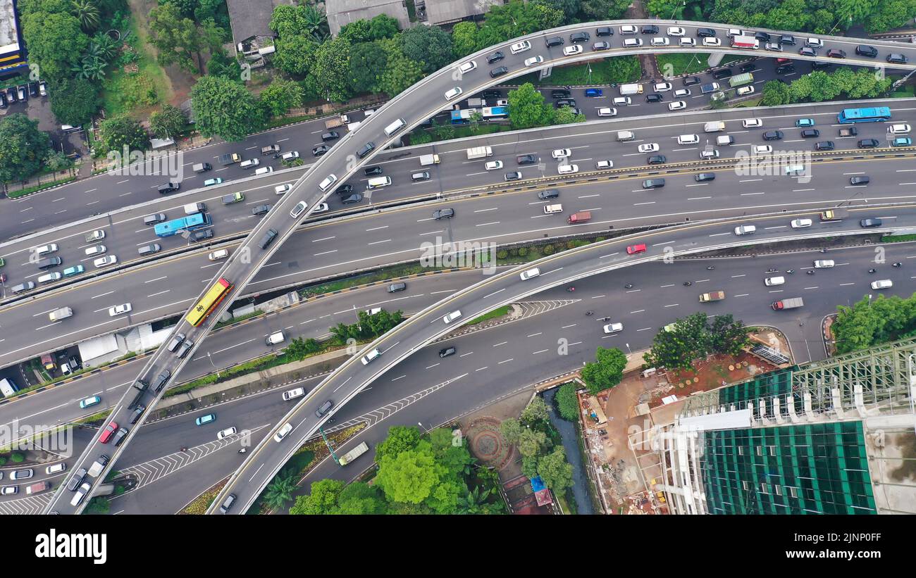 Aerial top down view on massive multi-level interchange on Jakarta city ...