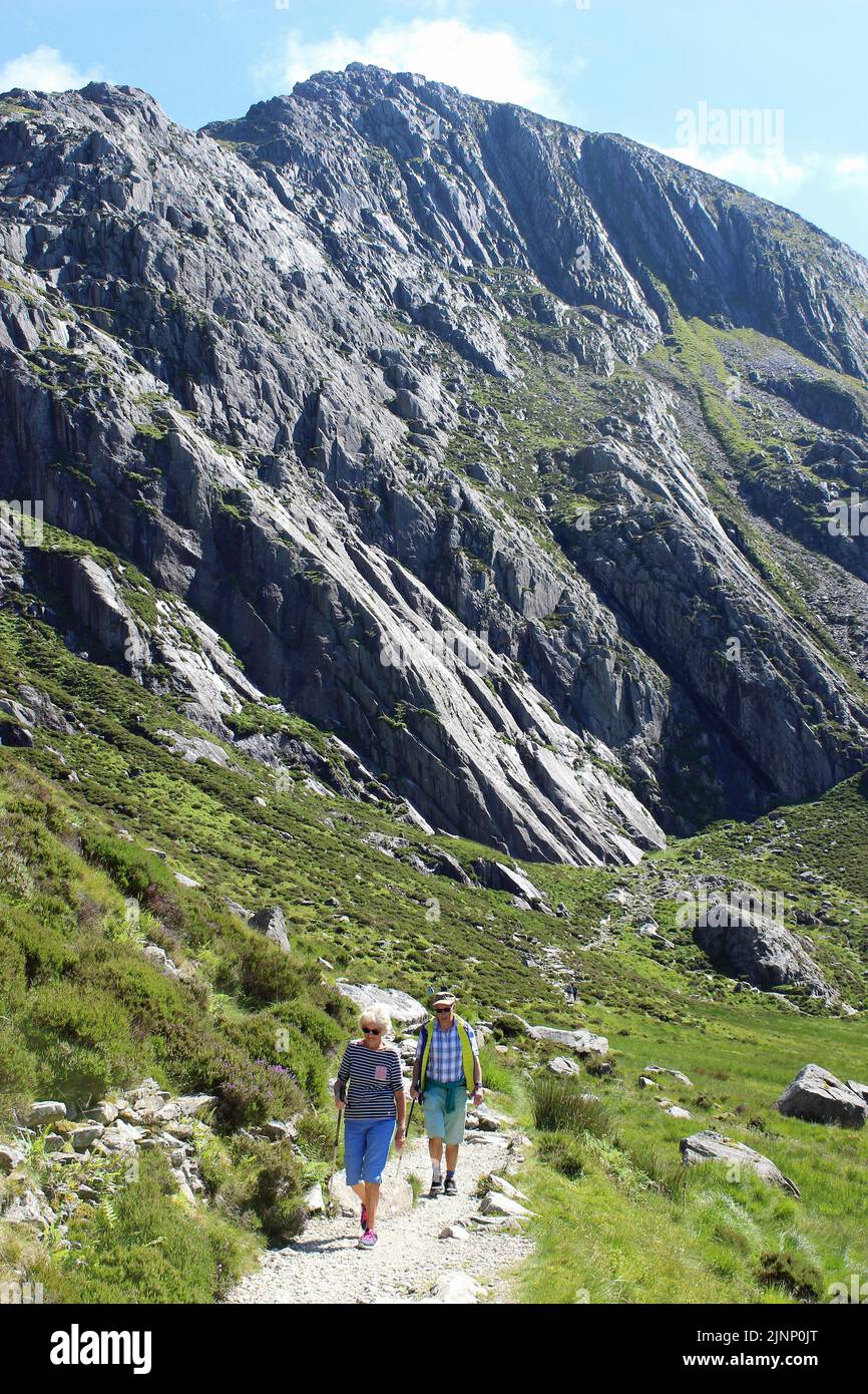 Two Senior Walkers On The Path Around Llyn Idwal, The Famous Idwal ...