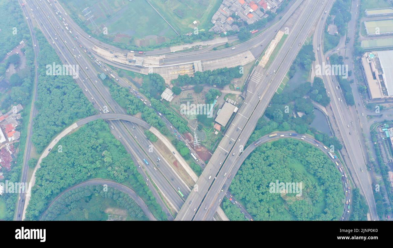 Aerial top down view on massive multi-level interchange on Jakarta city ...