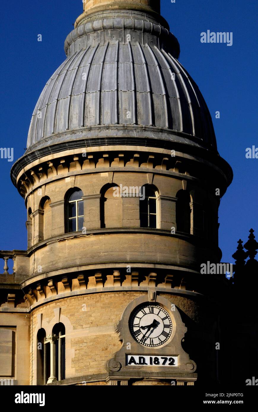 A ribbed, lead-covered dome tops the round chimney tower of the former ...