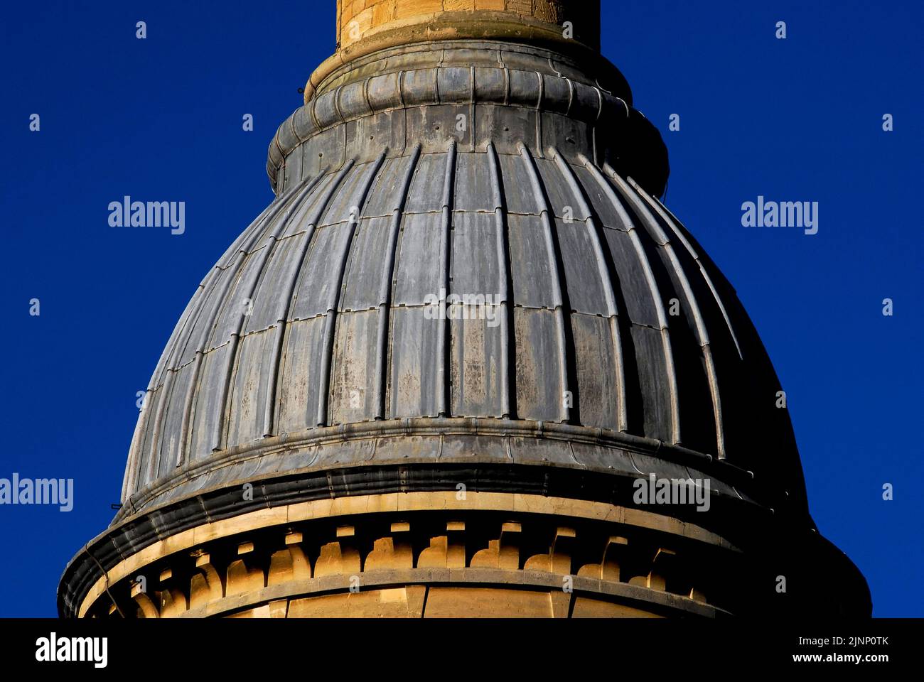 This ribbed, lead-covered dome tops the round clock tower of the former ...