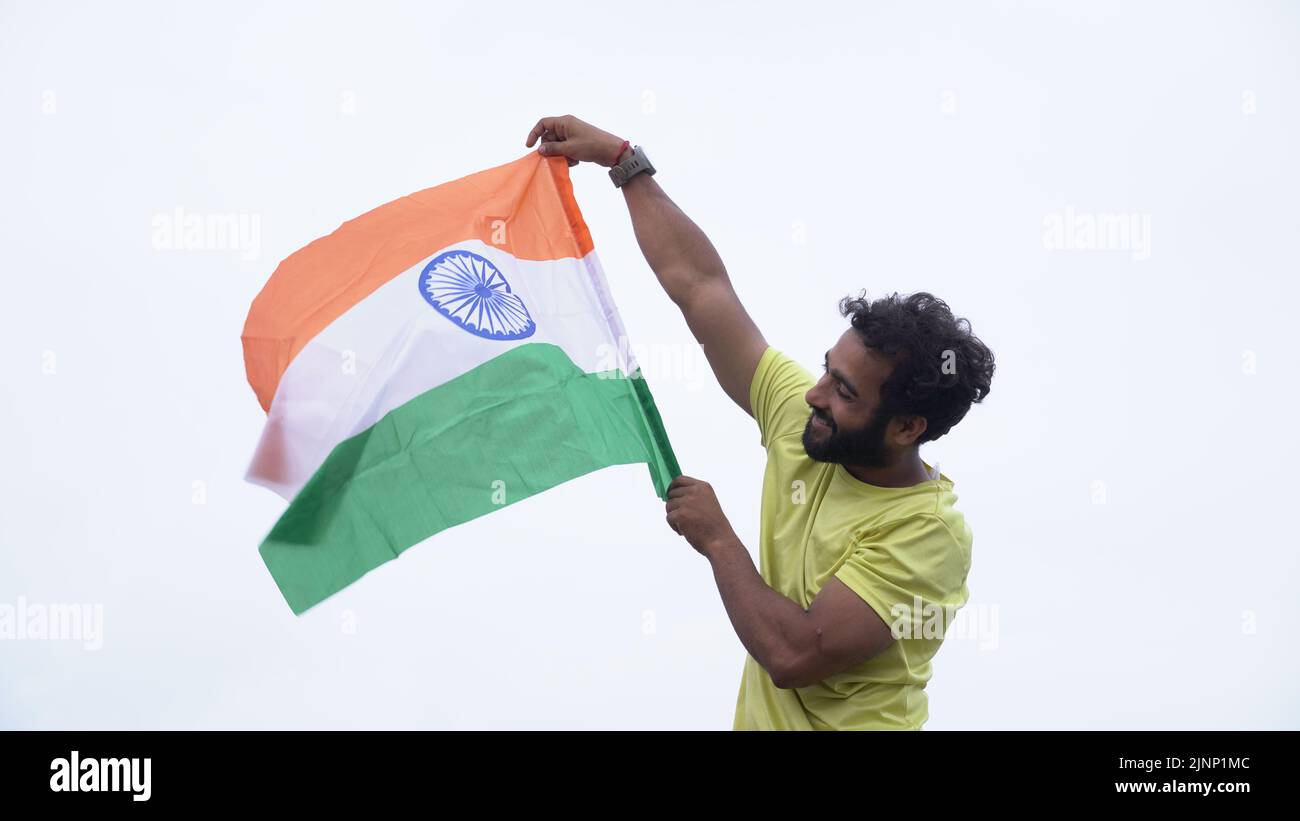 Indian man holding flag hi-res stock photography and images - Alamy