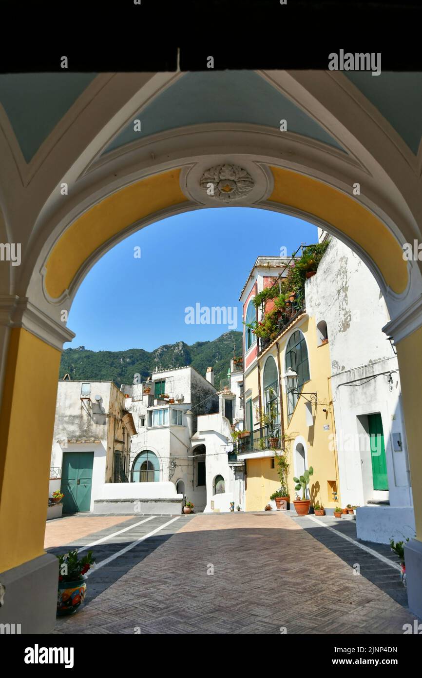 Houses of the village of Albori seen from the arch of a church, in the ...