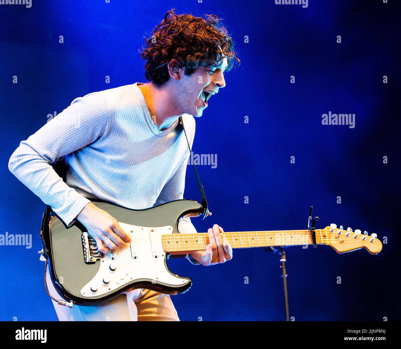 performing live on stage Stock Photo - Alamy