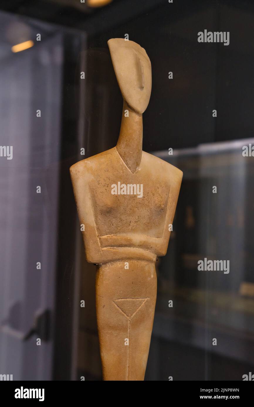 Stylized iconic female sculpture inside the Cycladic art museum in ...