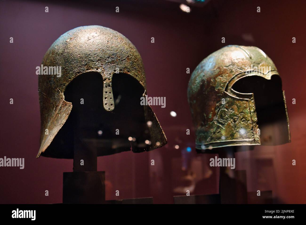 Greek ancient bronze helmets inside the Benaki museum in Athens Stock ...