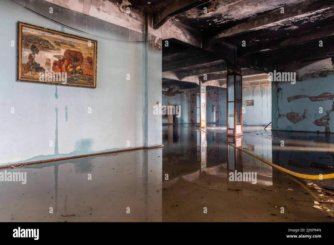 The flooded foyer of a specialized school after extinguishing a fire ...