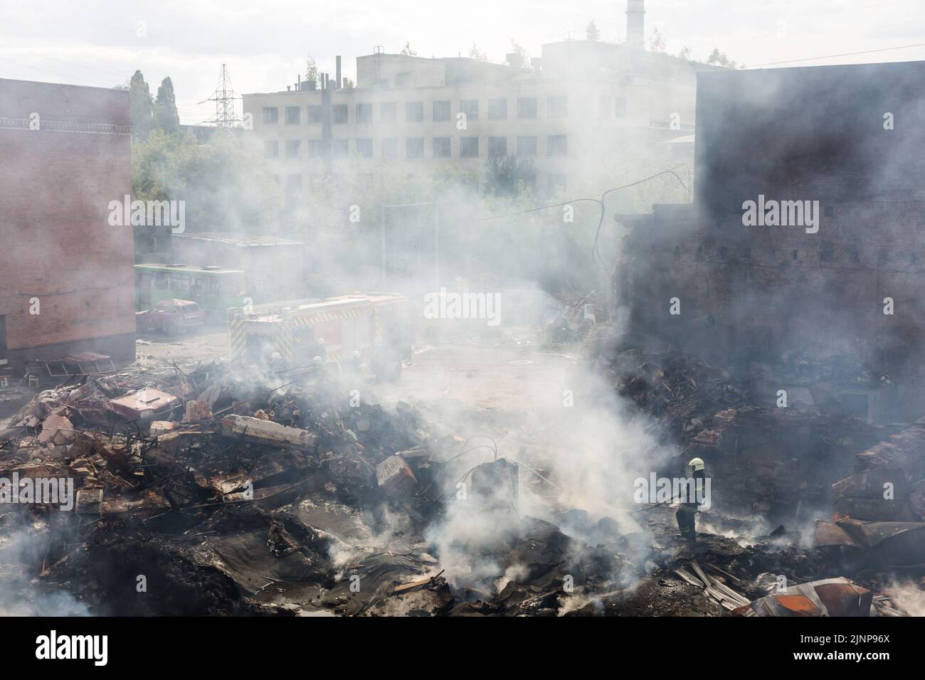 Firefighter works in highly damaged specialized school following night ...