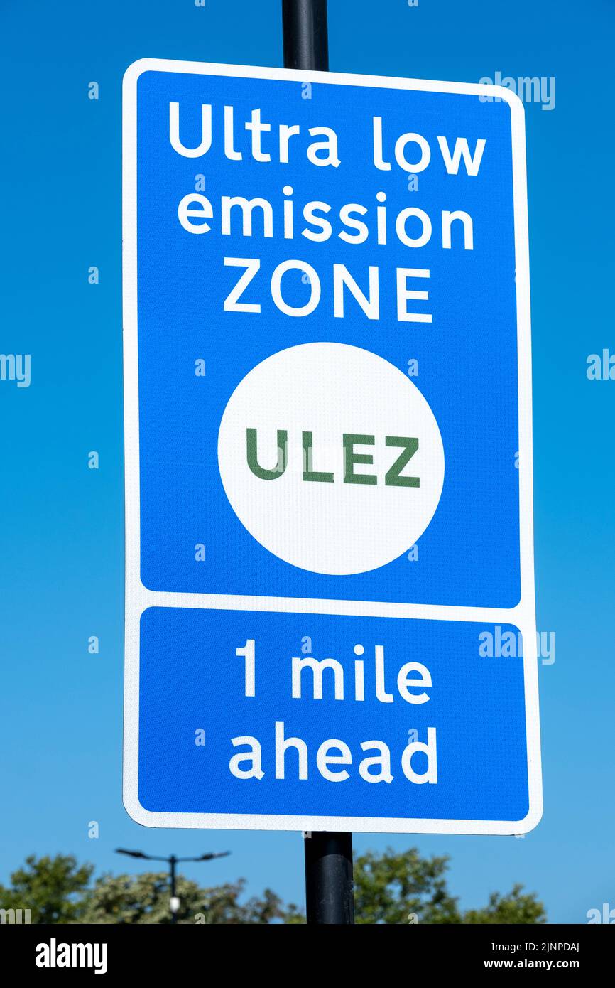 Close up of ULTRA LOW EMISSION ZONE sign against a clear blue sky Stock ...
