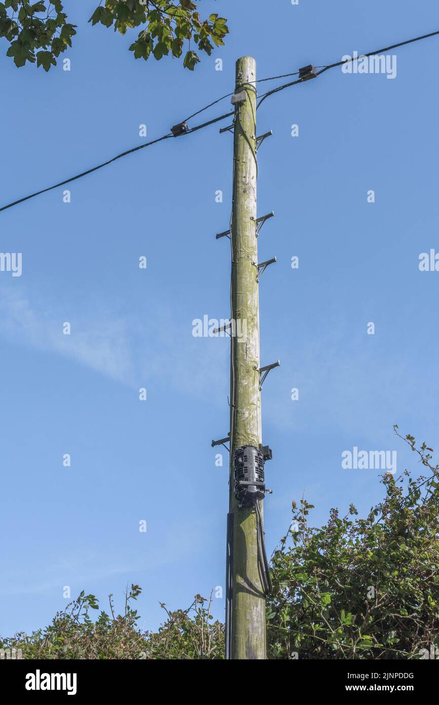Rural BT utility pole with fibre optic broadband and wiring ...