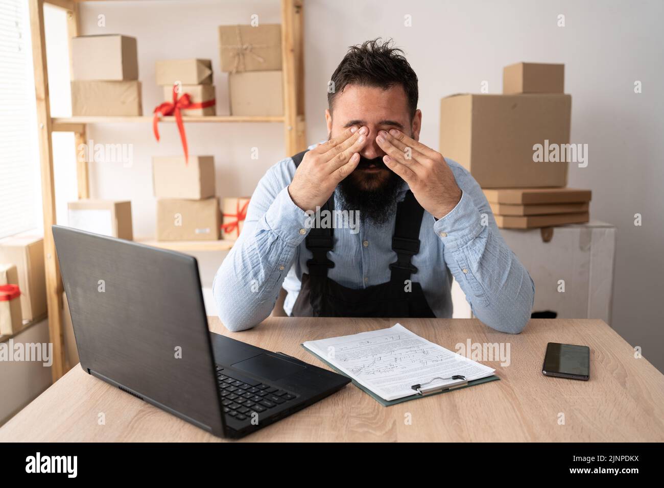 small business start up, indian male entrepreneur working at home ...