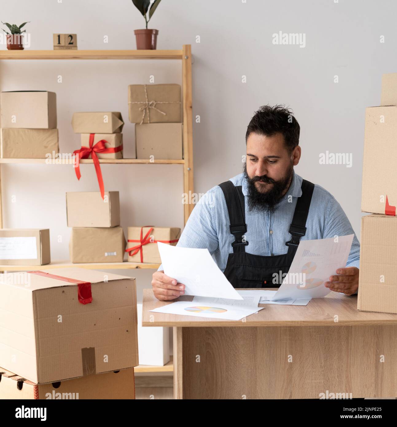 Starting small business, SME owner man entrepreneur prepare to pack the ...