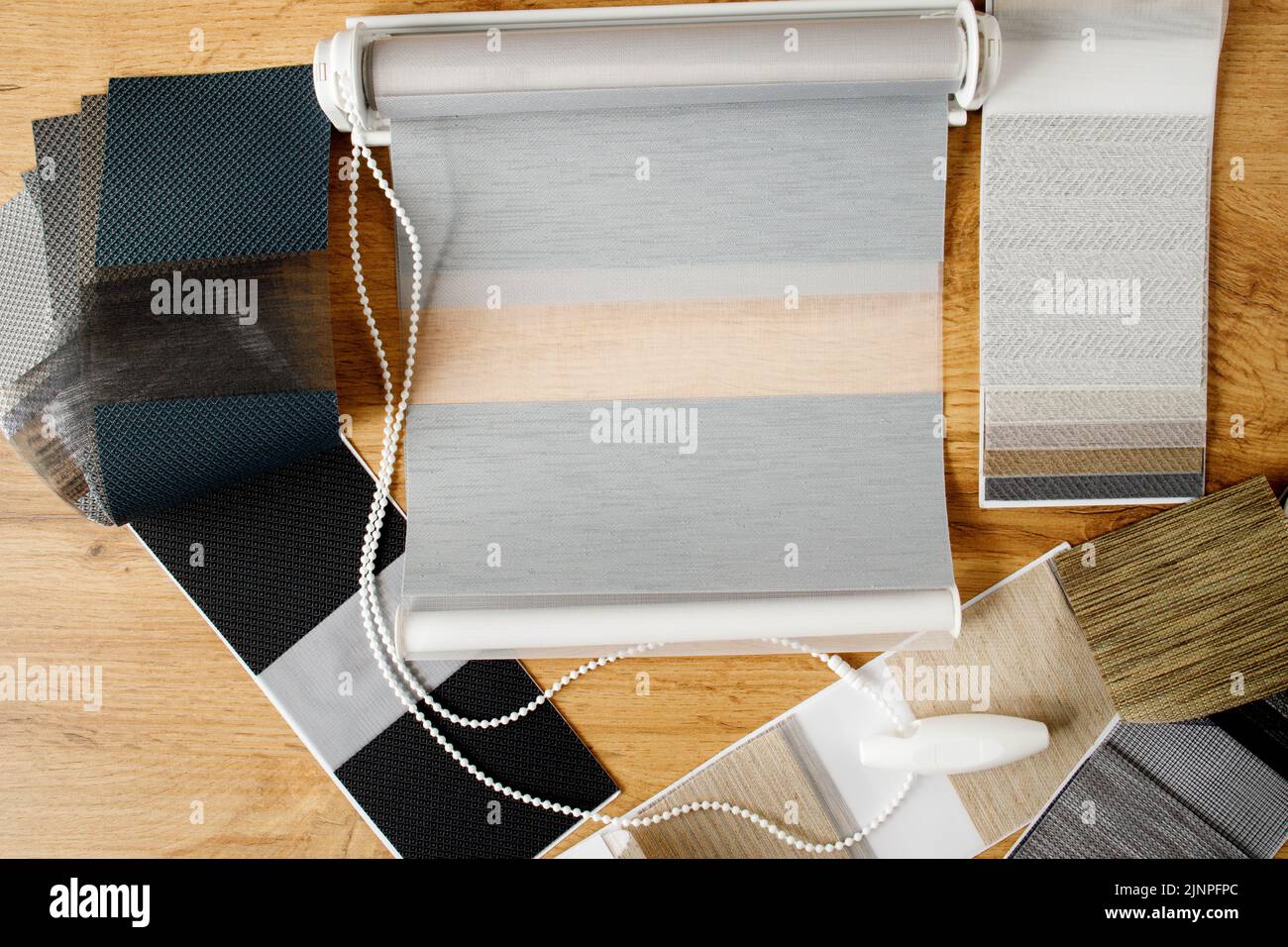 Samples of fabrics of different textures and colors in the form of a ...