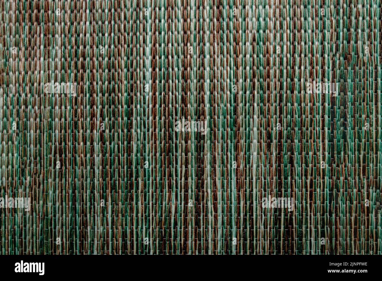 Background with intertwined different threads, close up. The structure ...