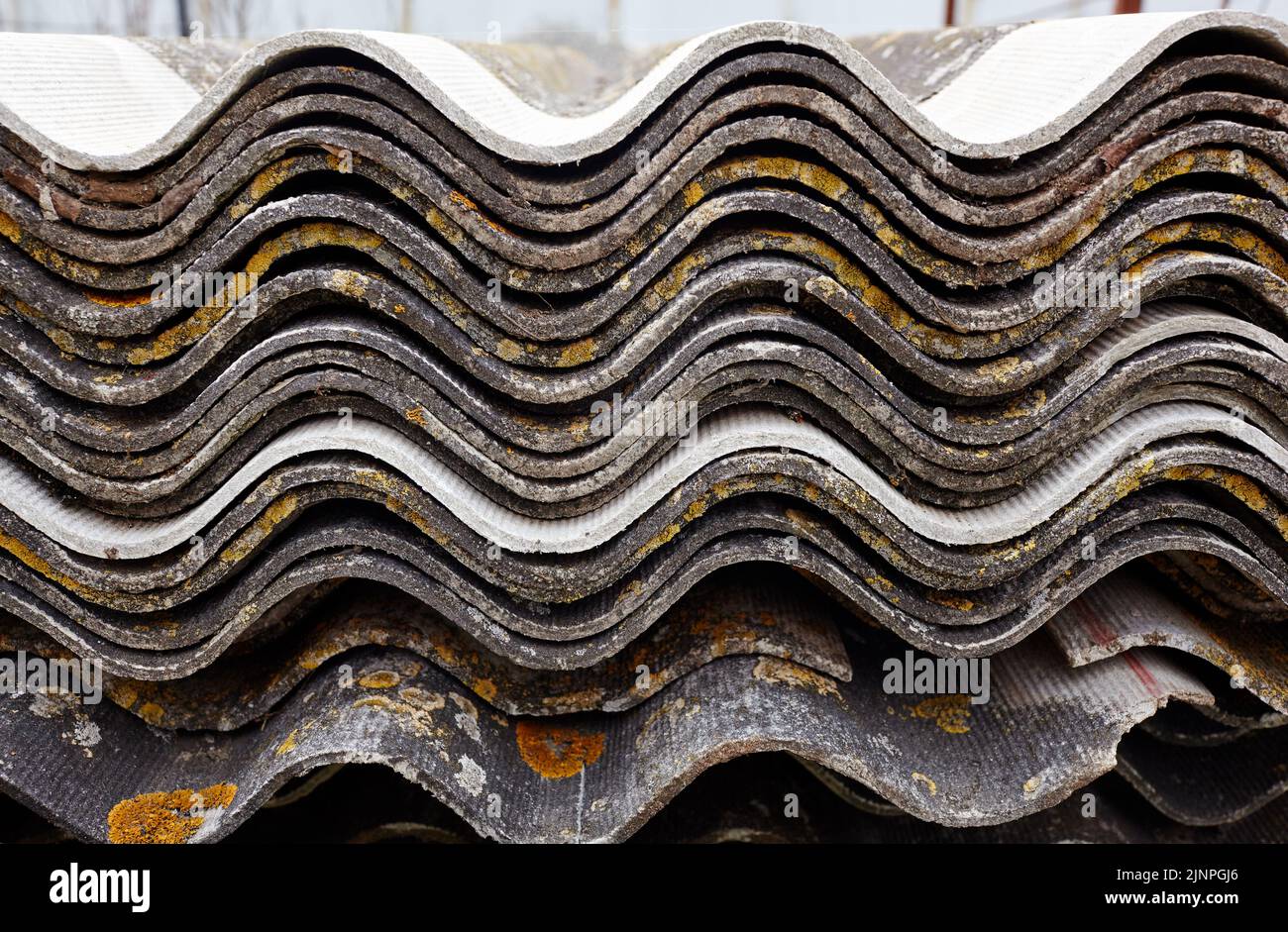 A stack of wave slate. Gray wavy slate. Slate Roofing. Home ...