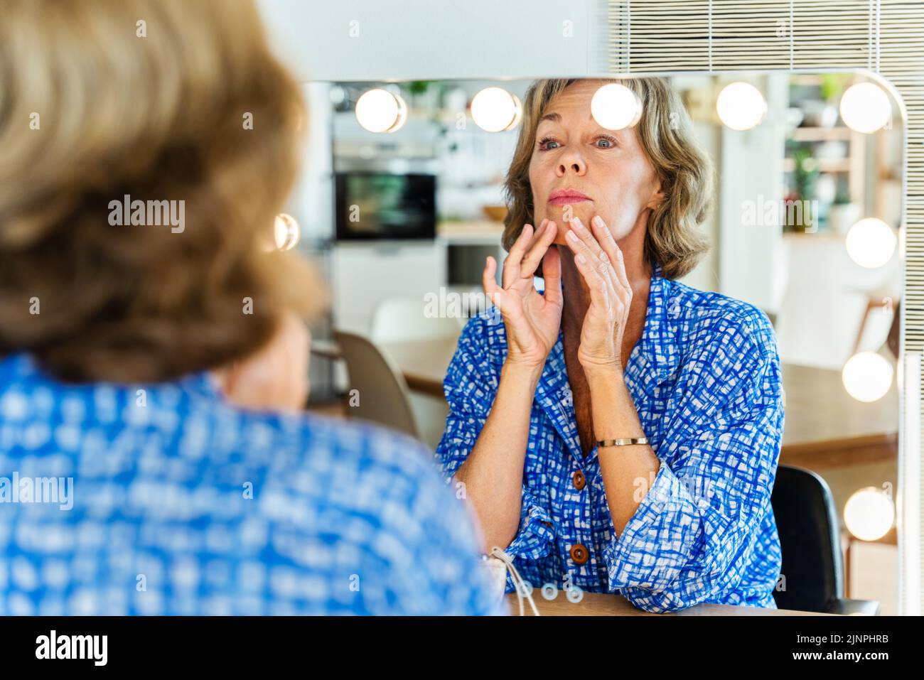 Beautiful mature senior woman at home, domestic life and leisure ...