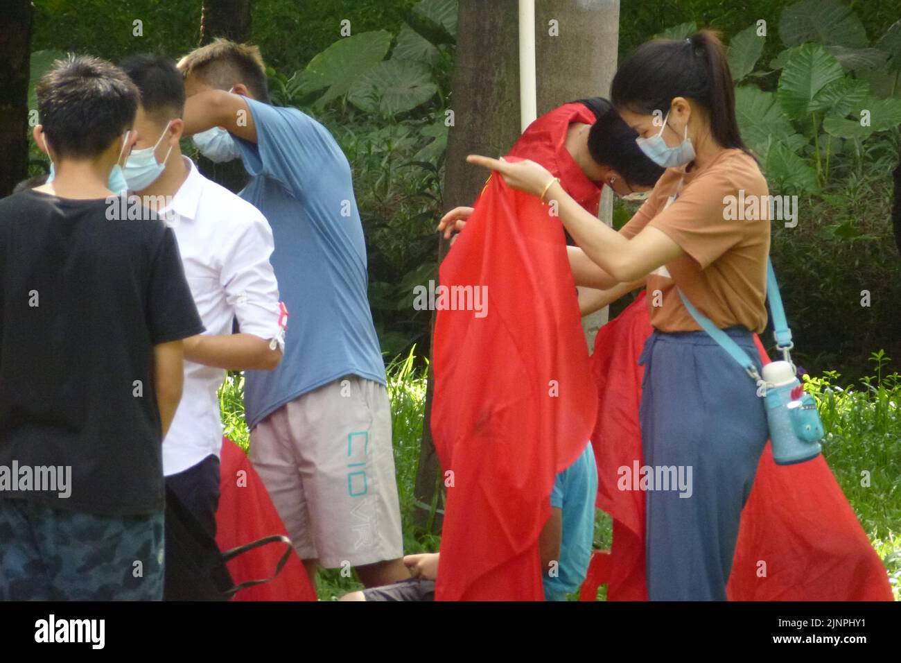 Shenzhen, China: roadside barber stalls charge cheap to attract people ...
