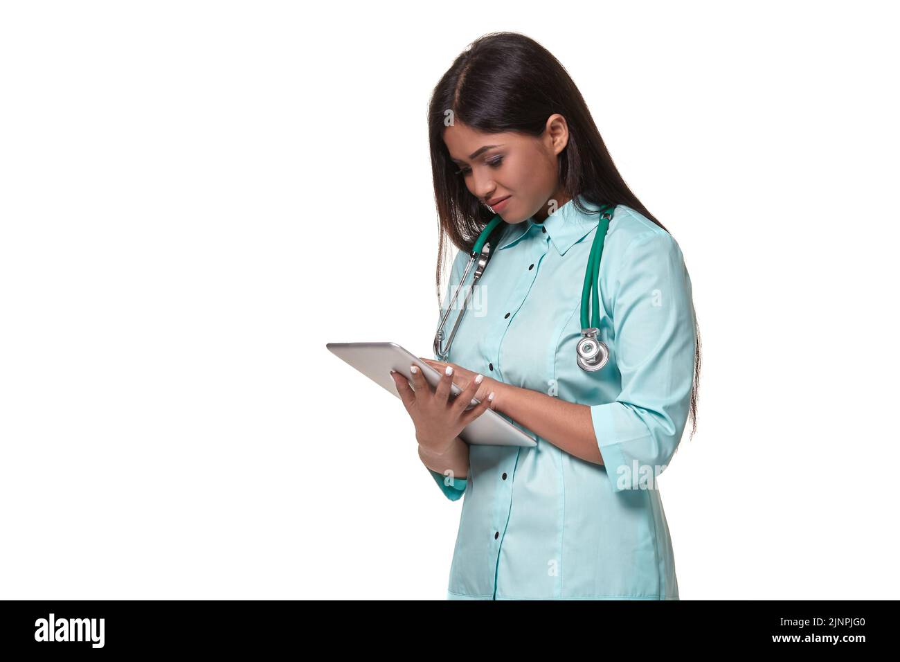 Young pretty doctor with a stethoscope and a medical history in her ...