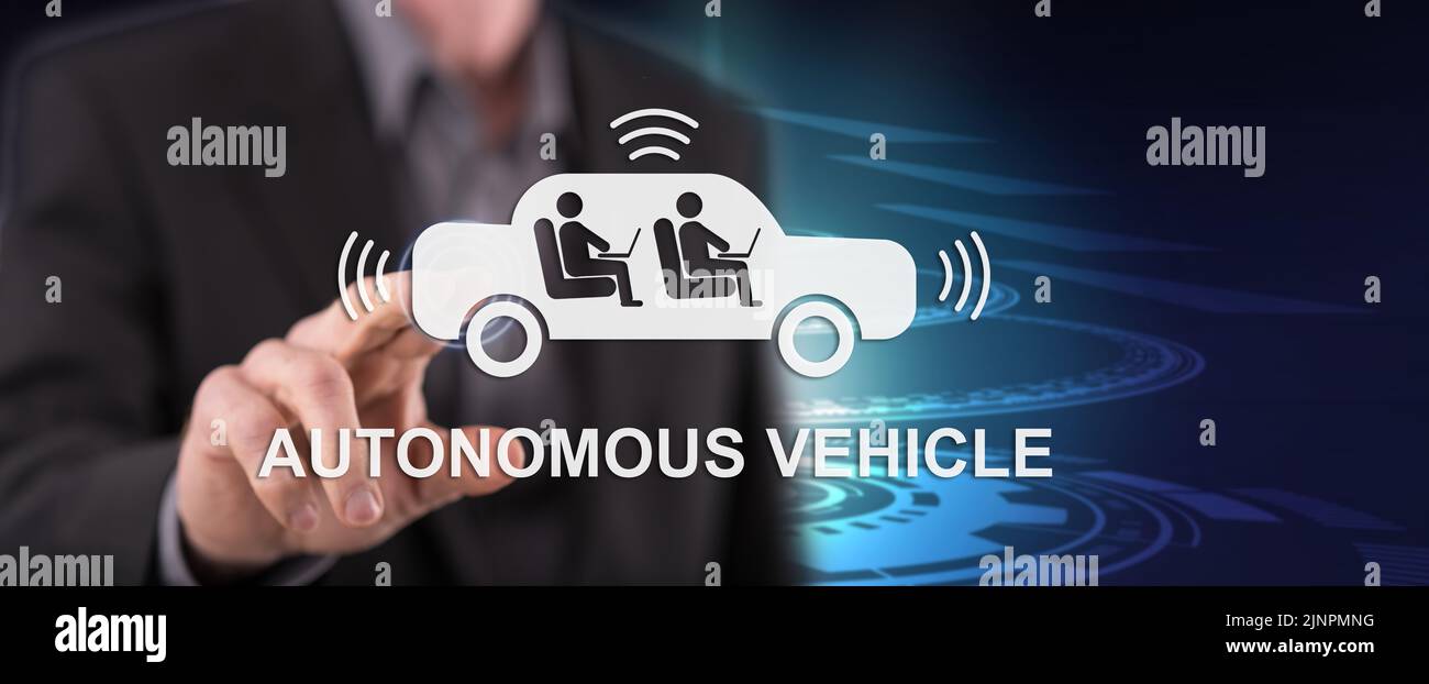 Man touching an autonomous vehicle concept on a touch screen with his ...