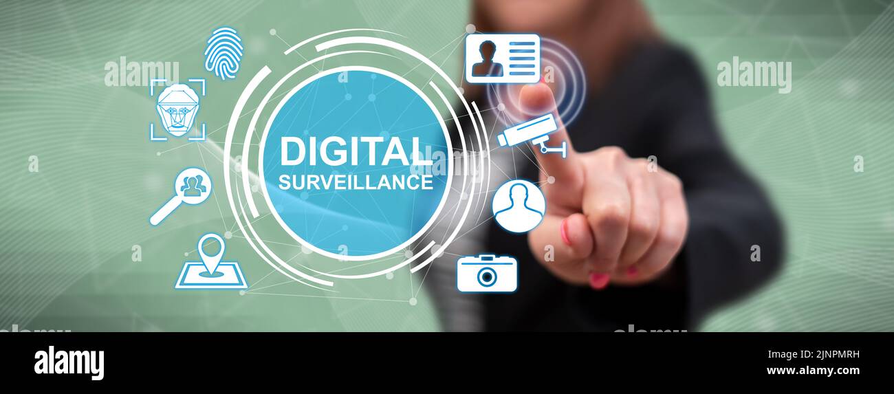Woman touching a digital surveillance concept on a touch screen with ...