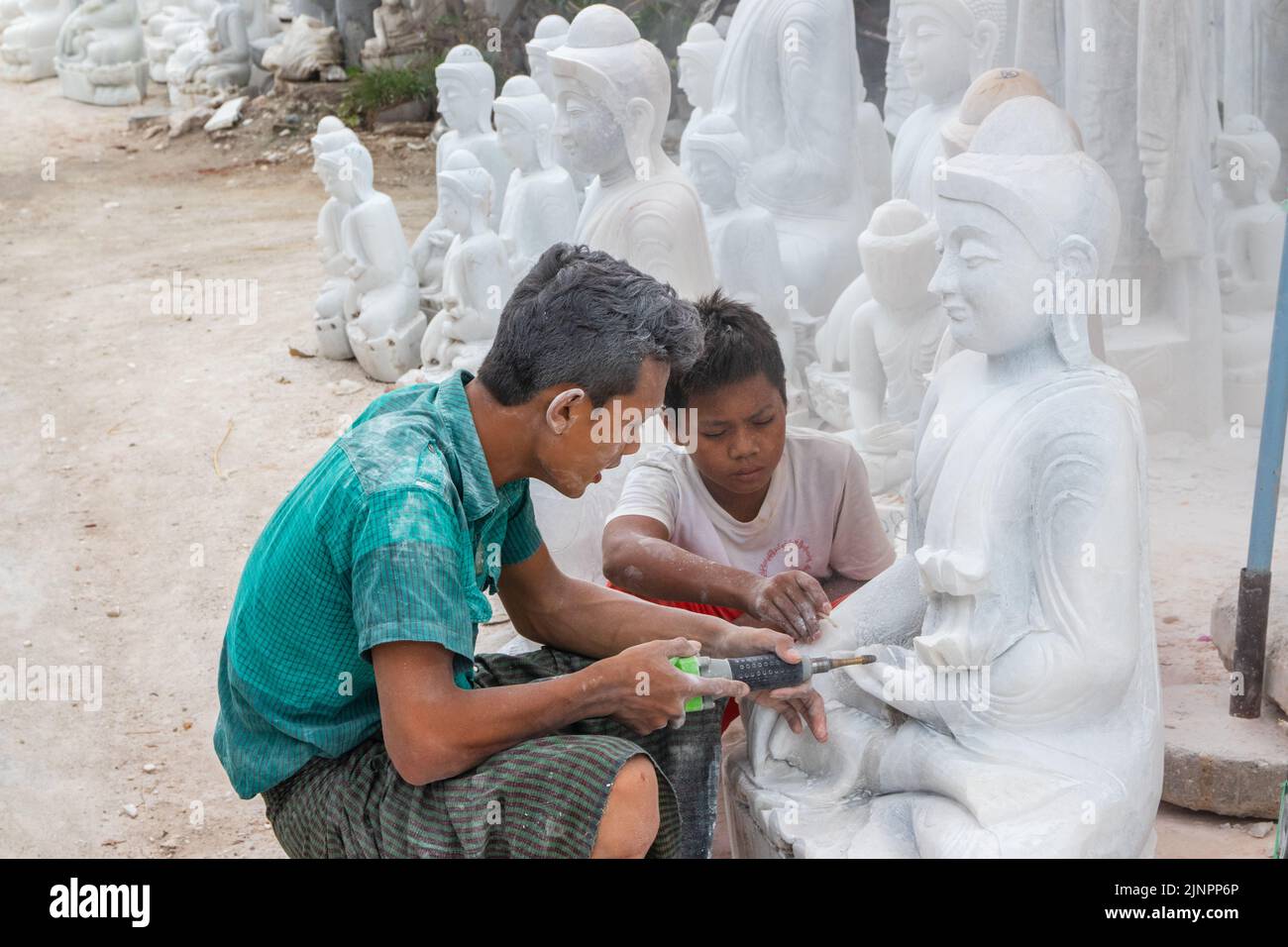 Stonemason working in Mandalay Myanmar Burma Southeast Asia Stock Photo ...