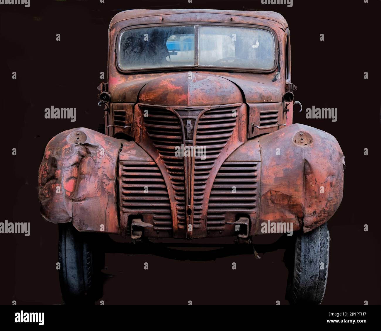 1940 rusty Fargo truck against black background Stock Photo - Alamy