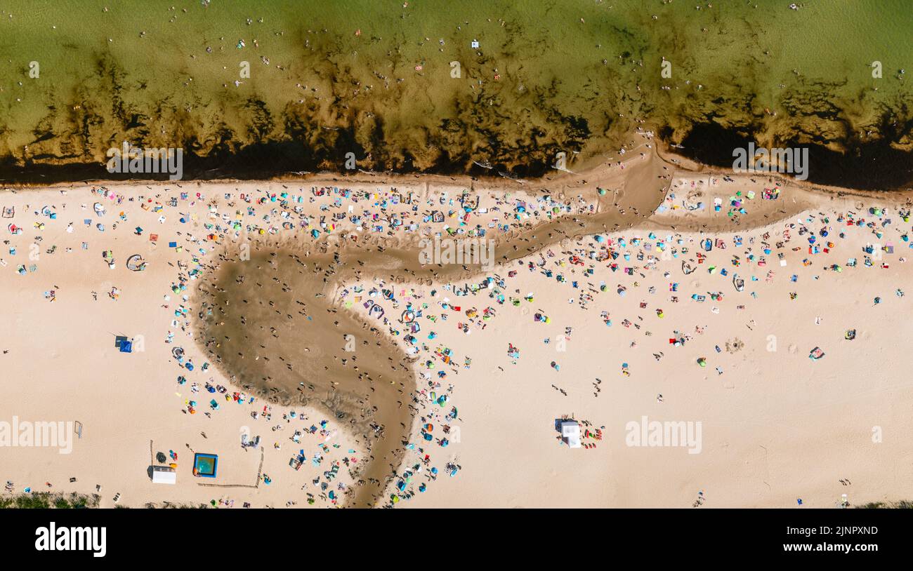 Baltic coast, people having bath in the sea and in the Oliwski stream ...
