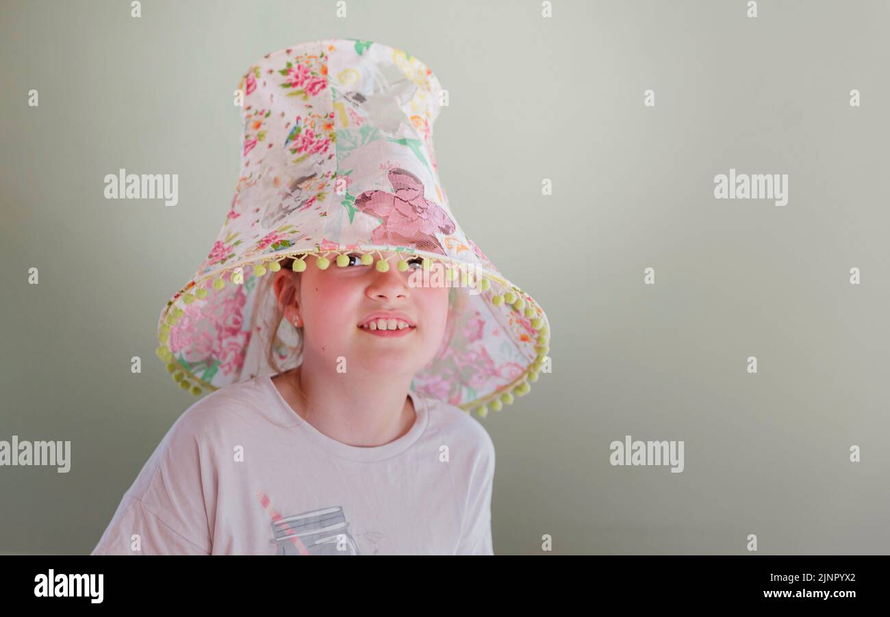 girl with a lampshade on her head || Model release available Stock ...