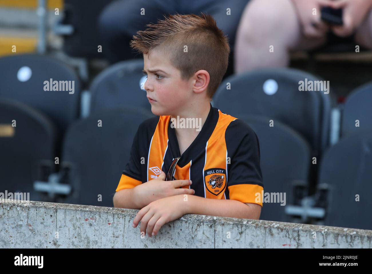 A young Hull City fan inside the MKM Stadium Stock Photo - Alamy