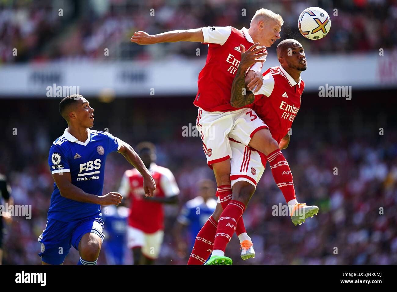Arsenal's Oleksandr Zinchenko and Gabriel head the ball away from ...