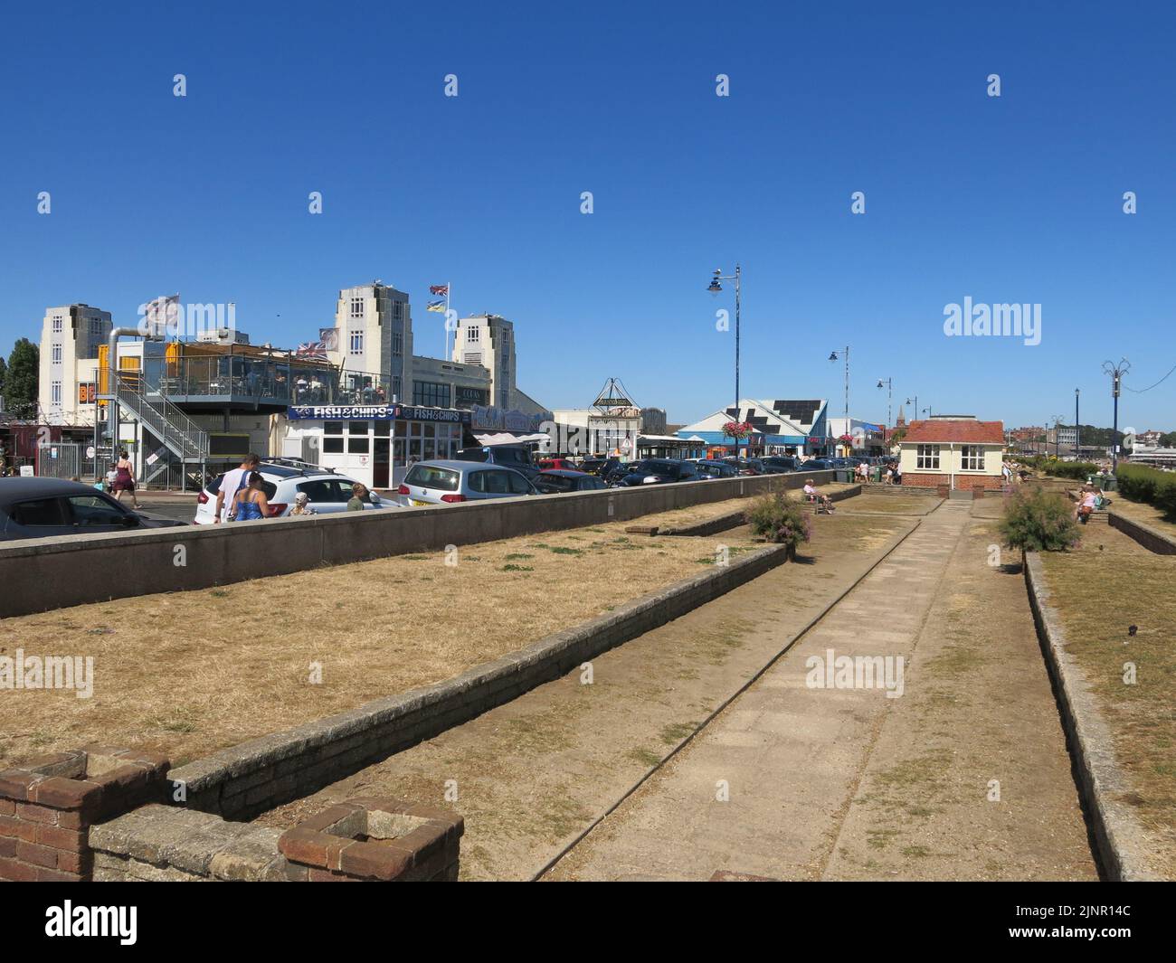 All the fun of the English seaside resort: Felixstowe promenade with ...
