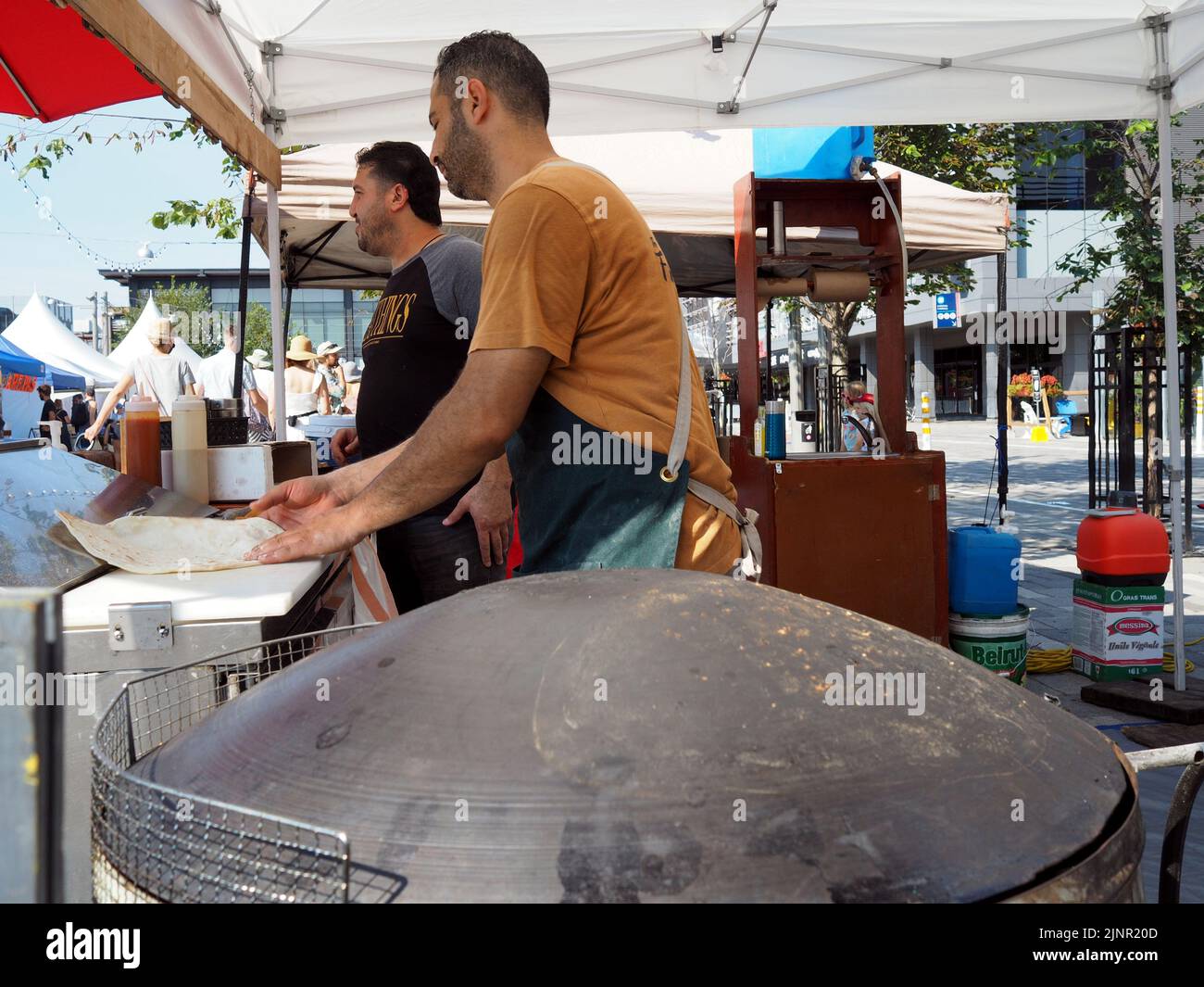 Scenes from the Farmer's Market at Lansdowne Place. Falafel guys doing ...