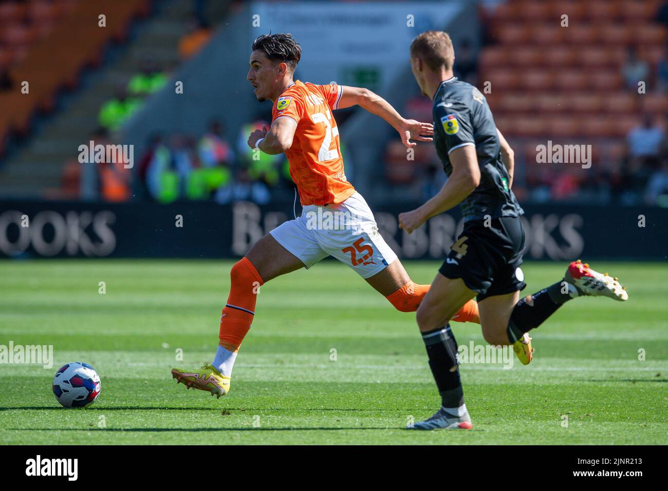 Theo Corbeanu #25 of Blackpool makes a break with the ball Stock Photo ...