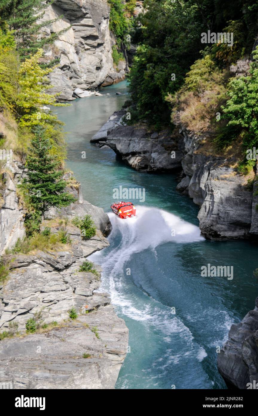 Visitors enjoy the high-speed thrills on a 'Shotover jet flat bottom ...