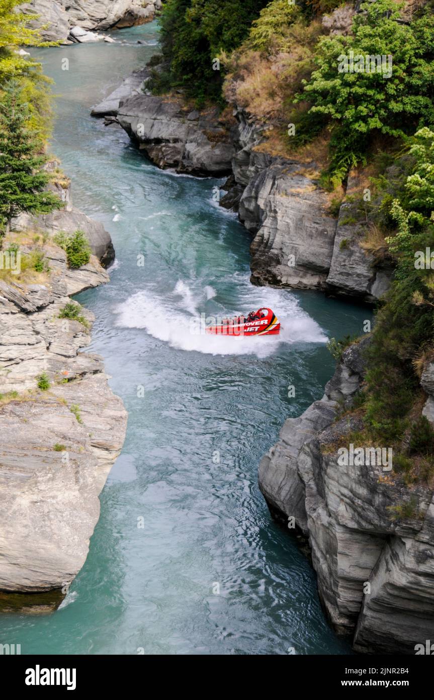 Visitors enjoy the high-speed thrills on a 'Shotover jet flat bottom ...