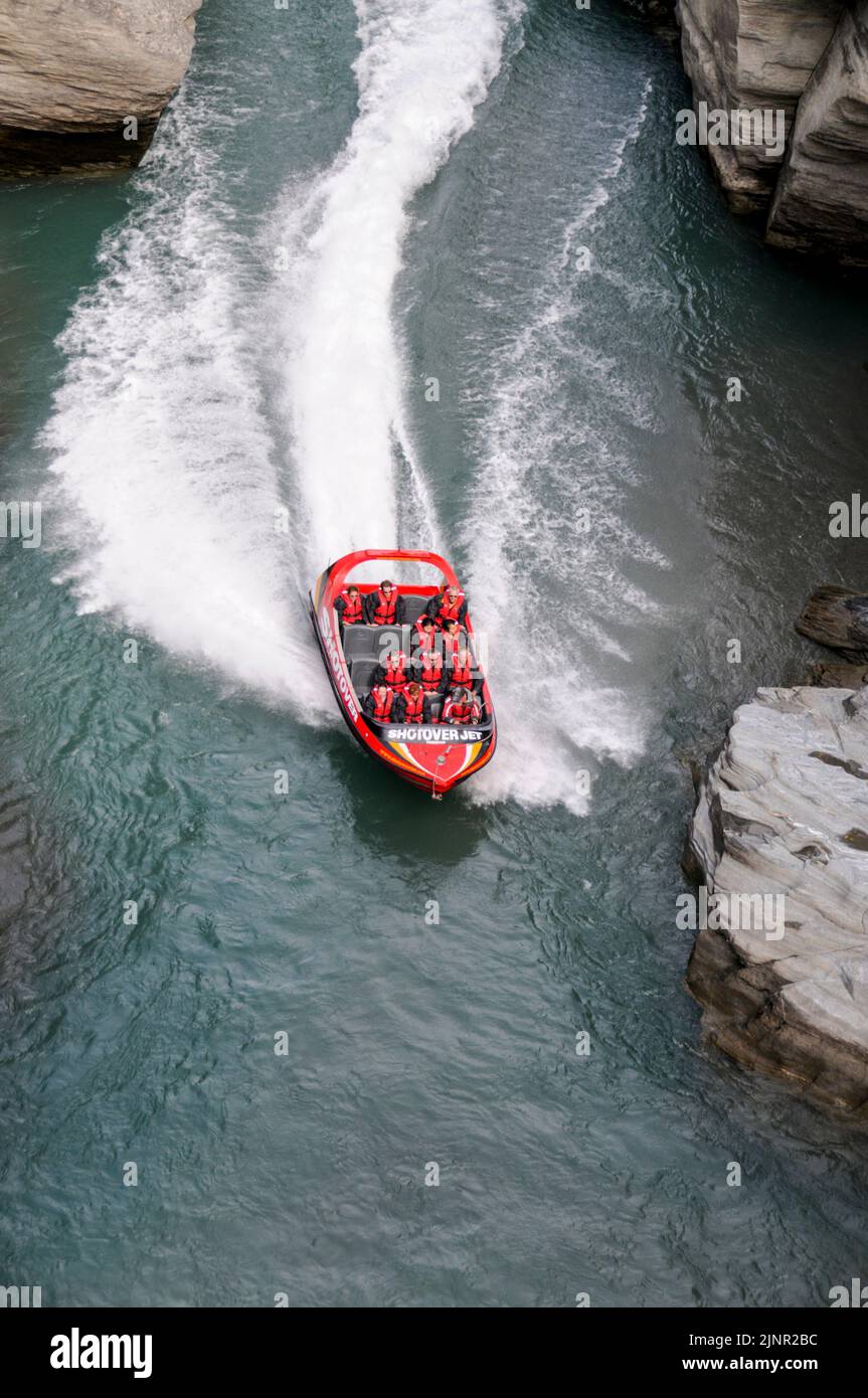 Visitors enjoy the high-speed thrills on a 'Shotover jet flat bottom ...
