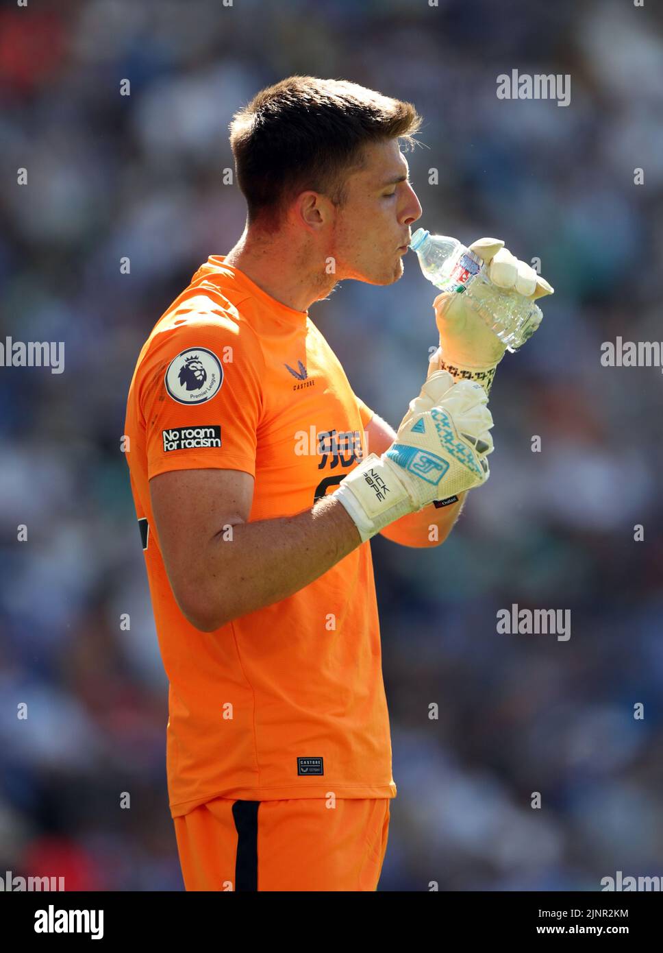 Newcastle United goalkeeper Nick Pope takes on water during the Premier ...