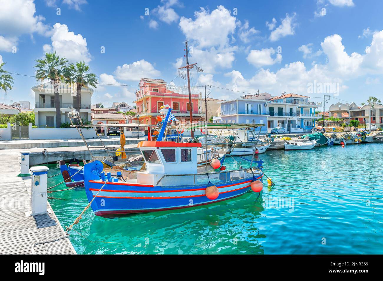 Landscape with fishing boats in port of Lixouri town, Kefalonia island ...