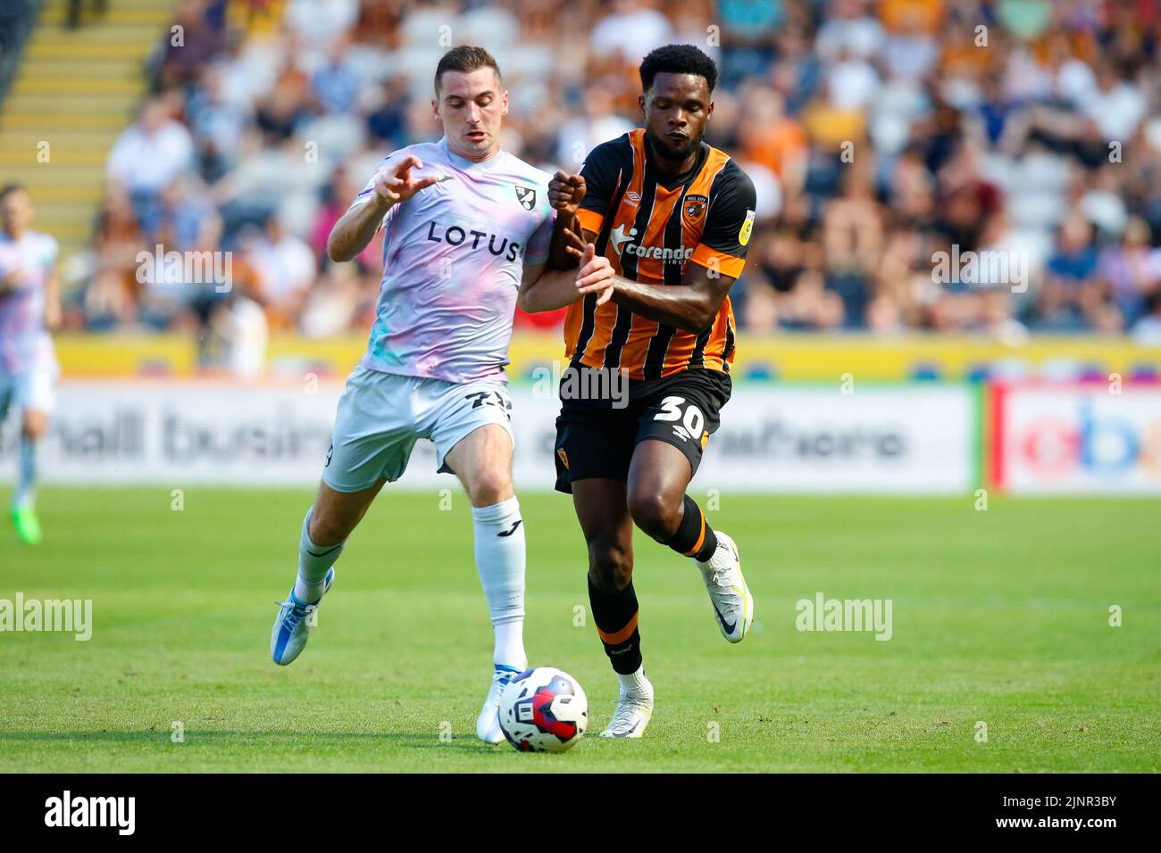 KennyÊMcLean #23 of Norwich City and Benjamin Tetteh #30 of Hull City ...