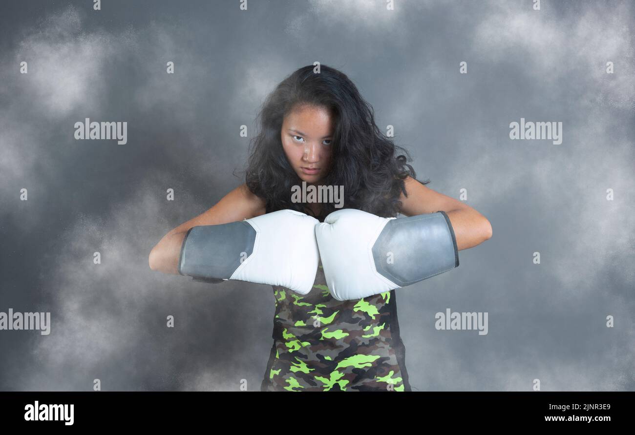 Chinese sportswoman with boxing gloves Stock Photo - Alamy